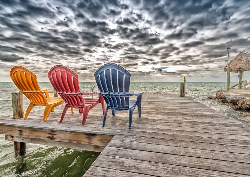 Colourful Chairs at Ocean Border Stock Image - Image of comfortable ...