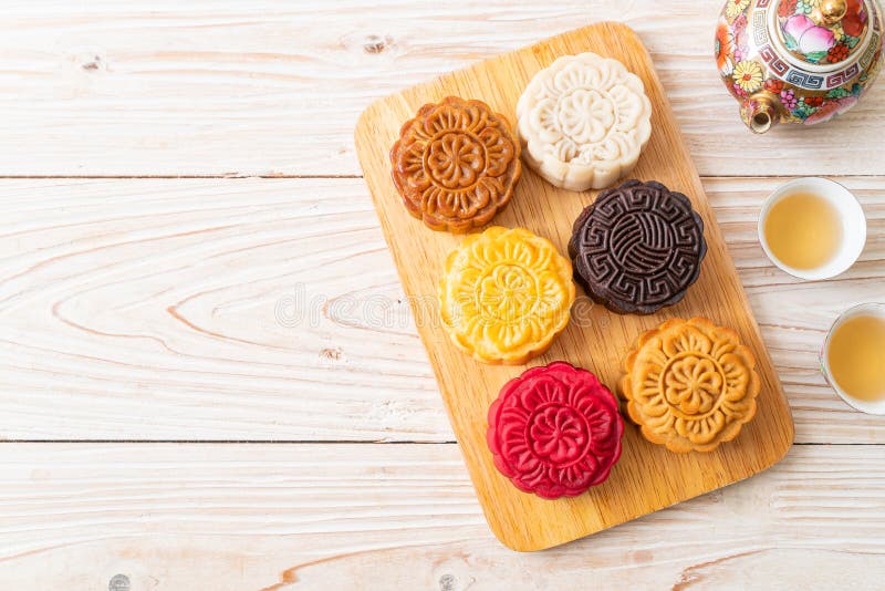 Colourful Chinese Moon Cake on Wood Plate Stock Image - Image of ...