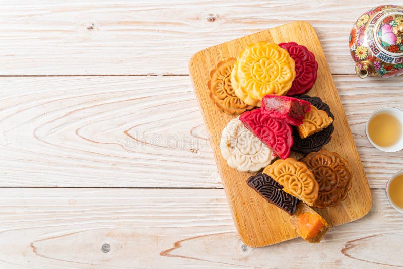 Colourful Chinese Moon Cake on Wood Plate Stock Image - Image of ...