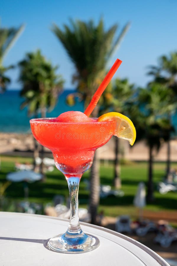 Colourful Cold Strawberry Daiquiri Cocktail Drink Served In Glass At