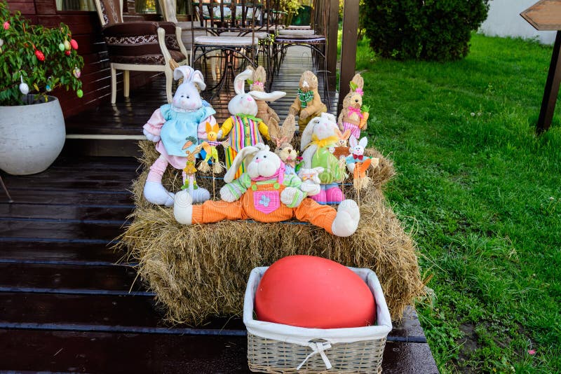 Colourful Easter Decorations and Bunnies Displayed Near an Outdoor ...