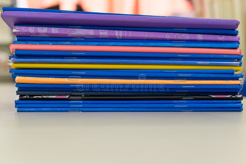 Colourful exercise books 3 stock image. Image of orange - 78769307