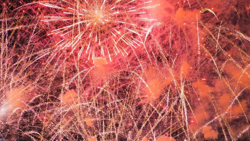 A Colourful Explosion of Red Fireworks in the Night Sky. Stock Photo ...