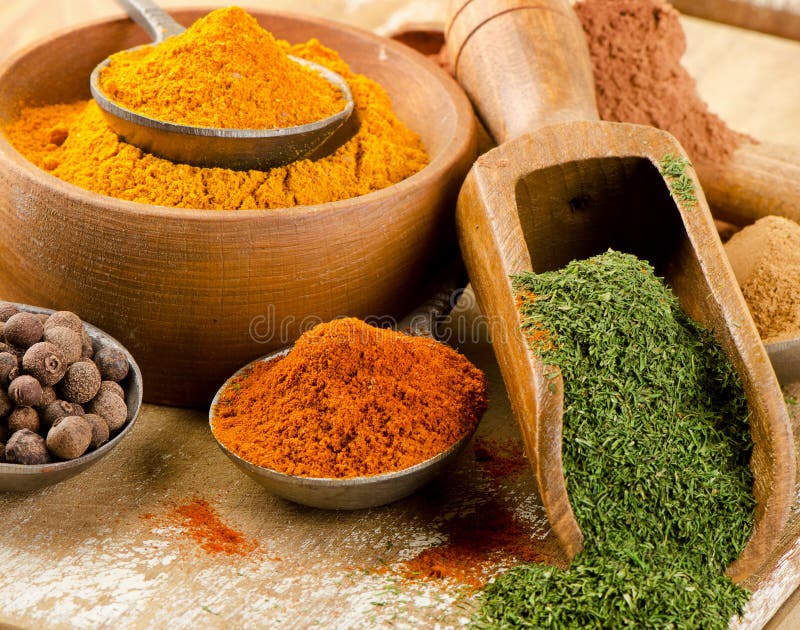 Colourful ground spices stock image. Image of wood, colorful - 50216267