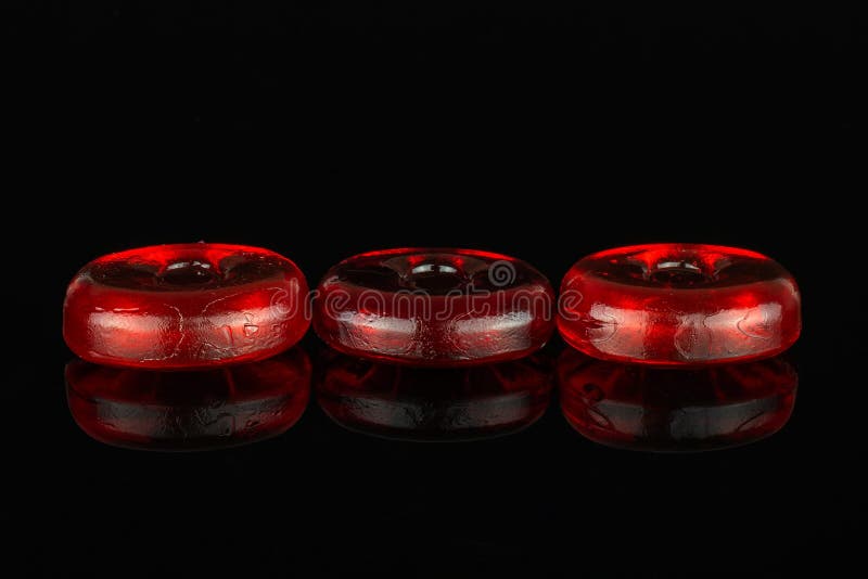 Colourful Hard Candy Isolated on Black Glass Stock Image - Image of ...