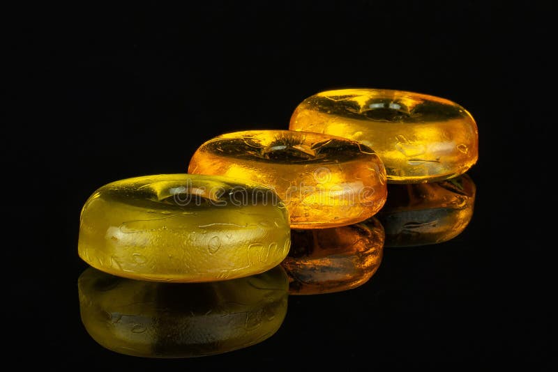 Colourful Hard Candy Isolated on Black Glass Stock Photo - Image of ...