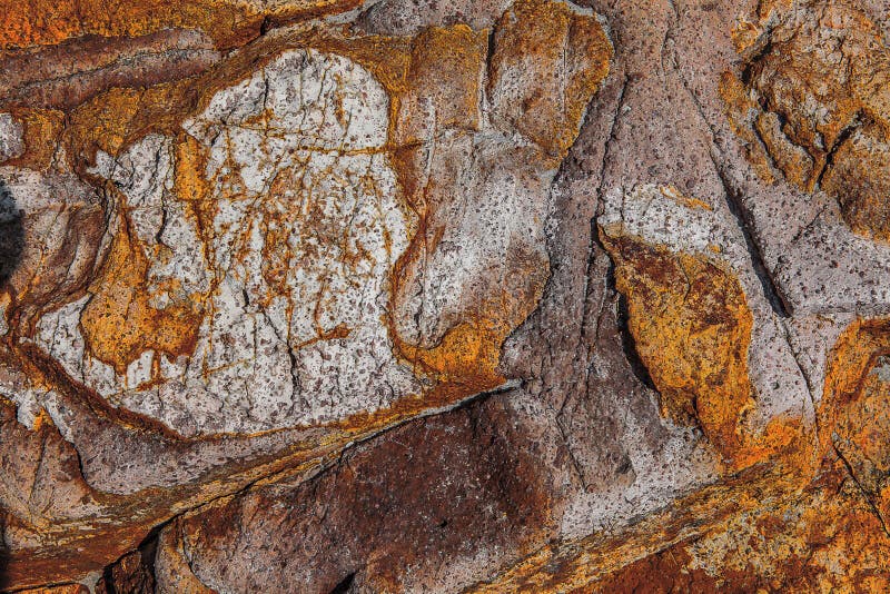 A Colourful, Harsh, Stone Background of a Rock Cliff Stock Photo ...