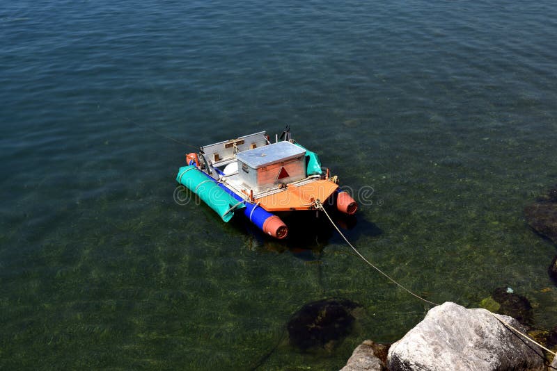 Colourful Home Made Fun Dinghy Stock Image - Image of homemade, rocks ...