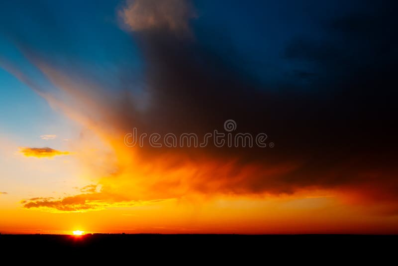 Colourful Landscape of Beautiful Sunset with Dark Clouds. Stock Image ...