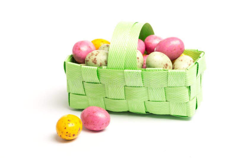 Colourful Little Easter Eggs in a Green Wicker Basket Stock Image ...