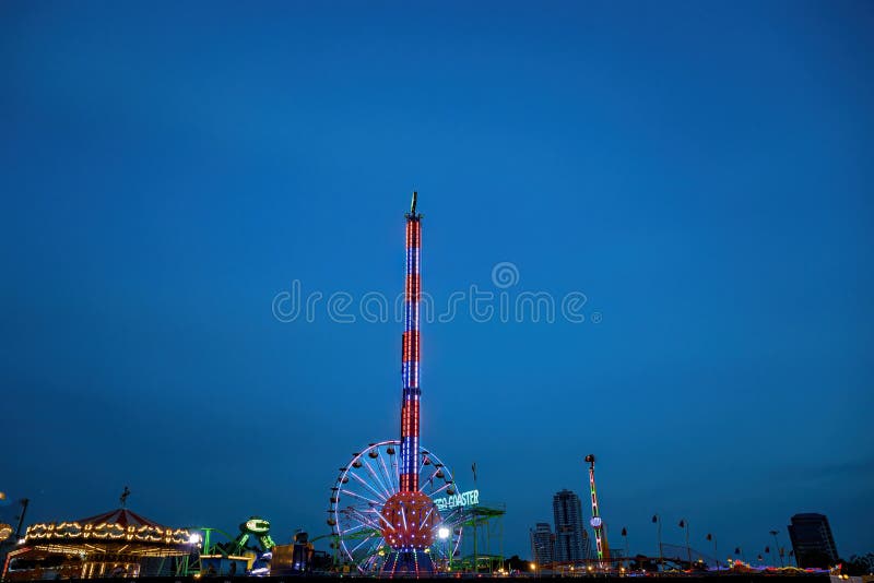 Colourful Neon of Fun Fair at Night Stock Image - Image of seats, dark ...