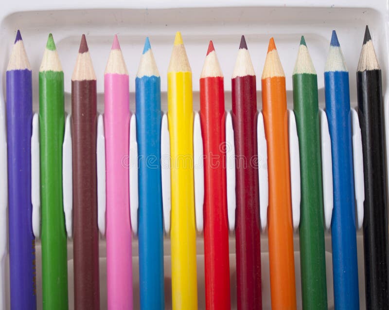 Colourful pencils isolated stock photo. Image of orange - 27534638