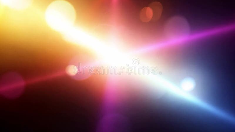 Colourful Rays of Light and Glows and Lens Flares on a Dark Background ...