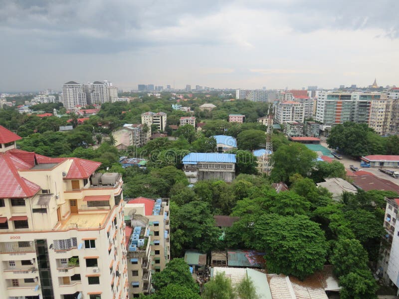 The Colourful Rooftops and Greeen Trees of the Yangin Skyline Stock ...