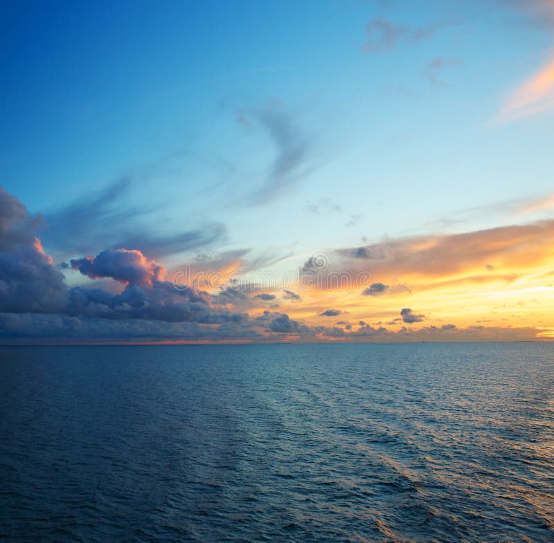 Colourful sky over sea stock photo. Image of peaceful - 27994908