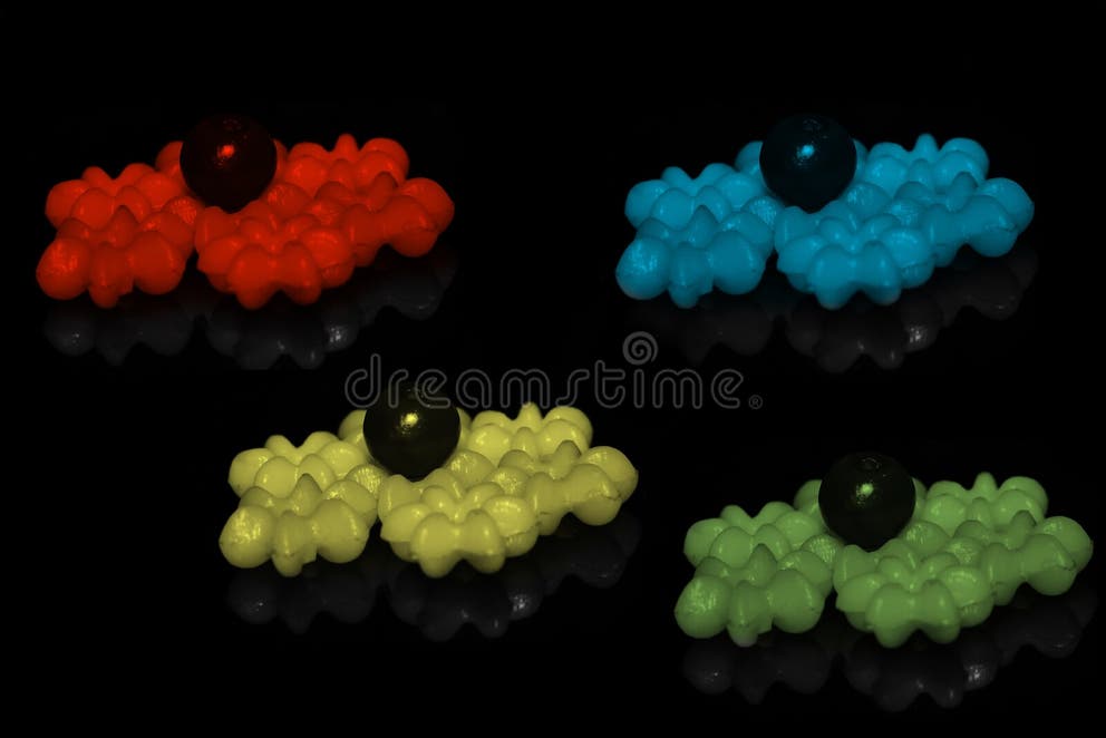 Colourful Small Plastic Objects on a Black Surface Stock Photo - Image ...