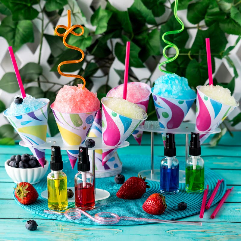 Colourful Snow Cones with Fruit Flavoured Syrups, Ready for Sharing ...