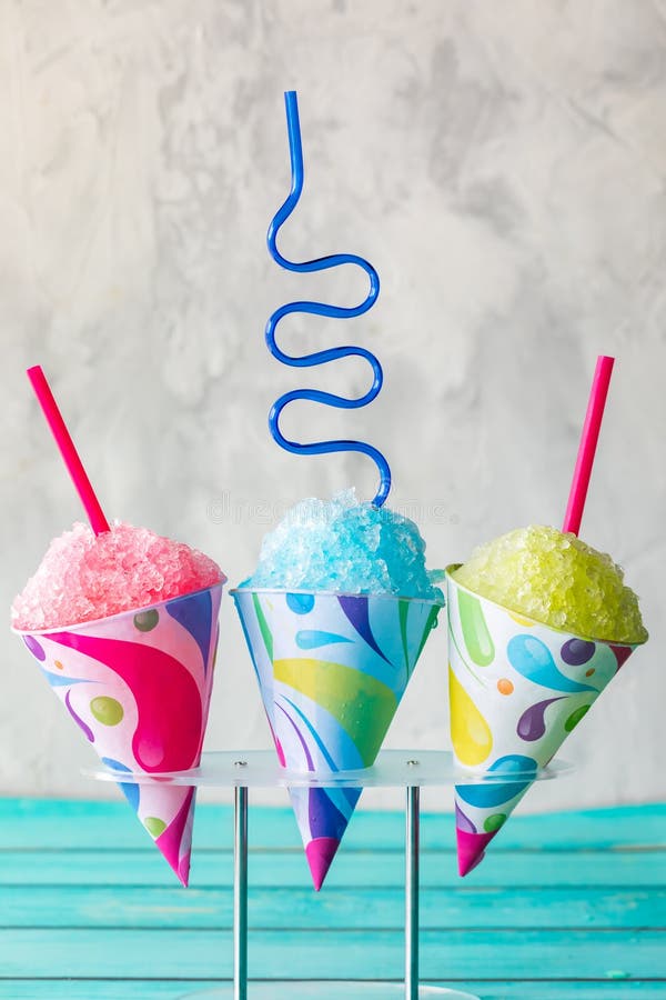 Colourful Snow Cones in a Stand Against a Light Background. Stock Image ...
