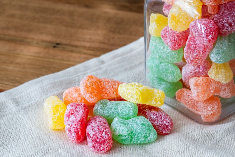 Colourful Sour Candies on a Cloth with a Candy Jar. Stock Image - Image ...