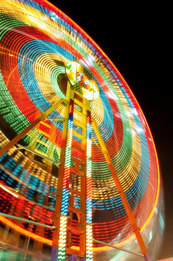Colourful Spinning Fun Fair Light Trail Stock Image - Image of spinning ...
