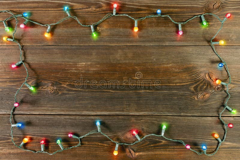 Colourful String of Christmas Lights on Rustic Planks. Stock Photo ...