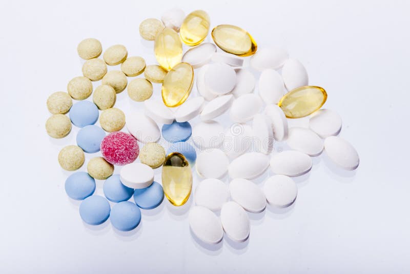 Colourful Tablets on White Background. Stock Image - Image of ...