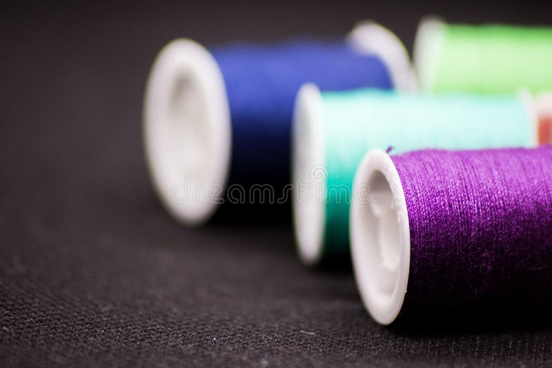 Colourful Thread Spools on a Black Background Stock Image - Image of ...