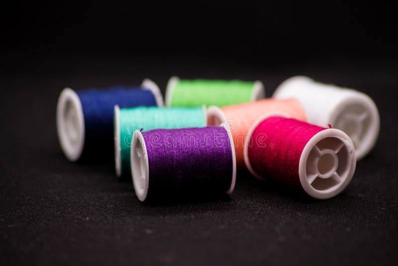 Colourful Thread Spools on a Black Background Stock Photo - Image of ...