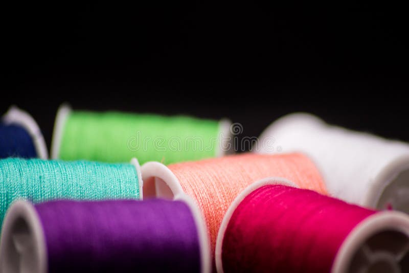 Colourful Thread Spools on a Black Background Stock Photo - Image of ...