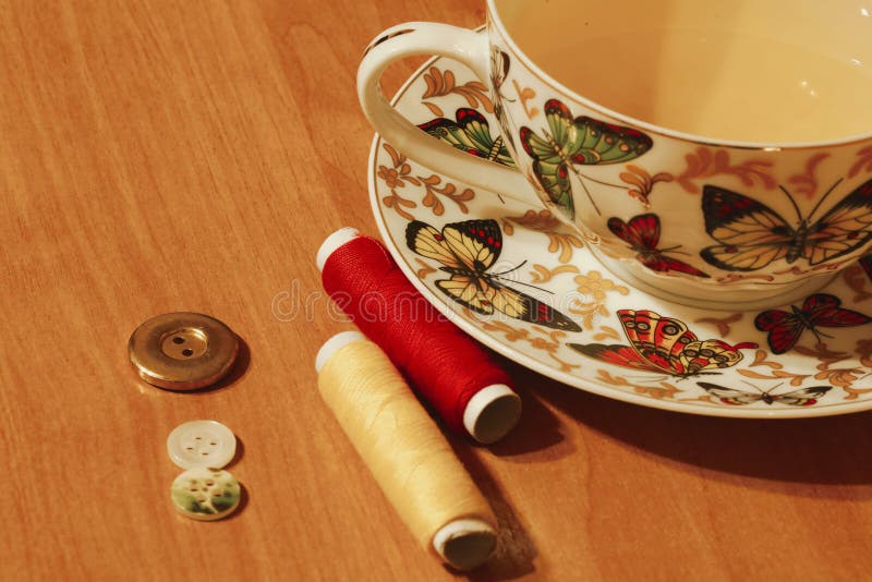 Colourful Thread Spools and Tea Cup Stock Photo - Image of colourful ...