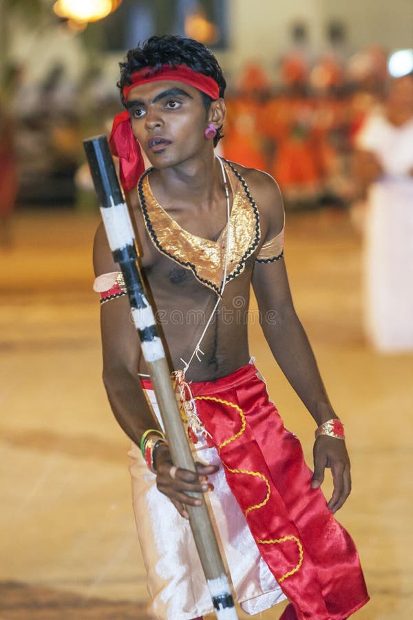 A Colourfully Dressed Stick Dancer Performs in the Kataragama Festival ...