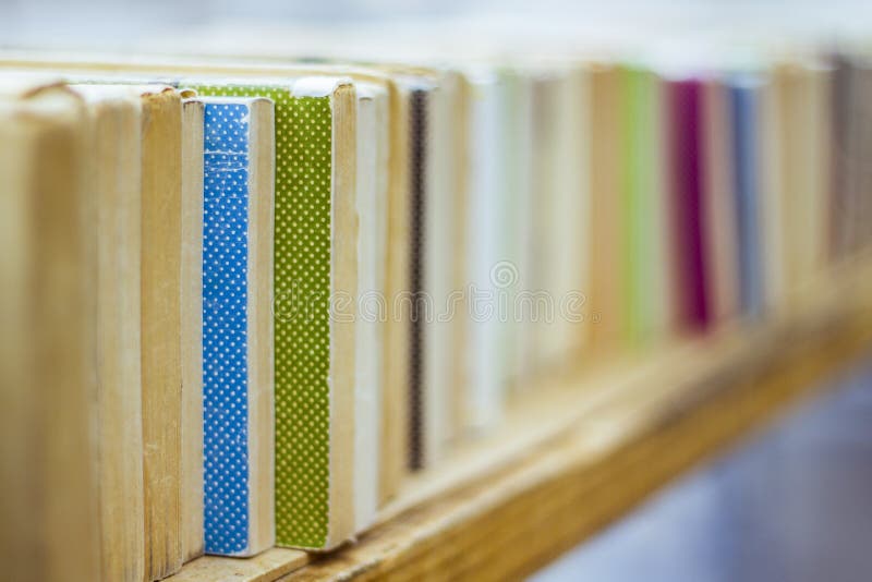 Old books in a row stock photo. Image of reading, dots - 104441614