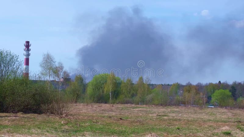 A Column of Black Smoke is Visible in the Distance. Fire after Shelling ...