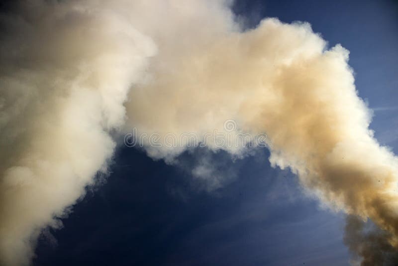 Intense column of smoke stock photo. Image of column - 133937382