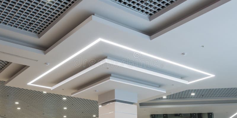Column in Interior with Suspended and Grid Ceiling with Halogen Spots ...