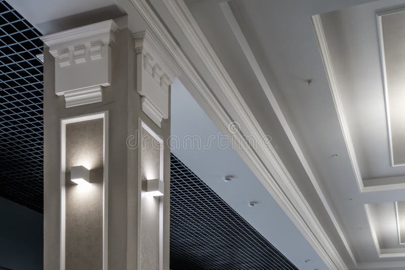 Column in Interior with Suspended and Grid Ceiling with Halogen Spots ...