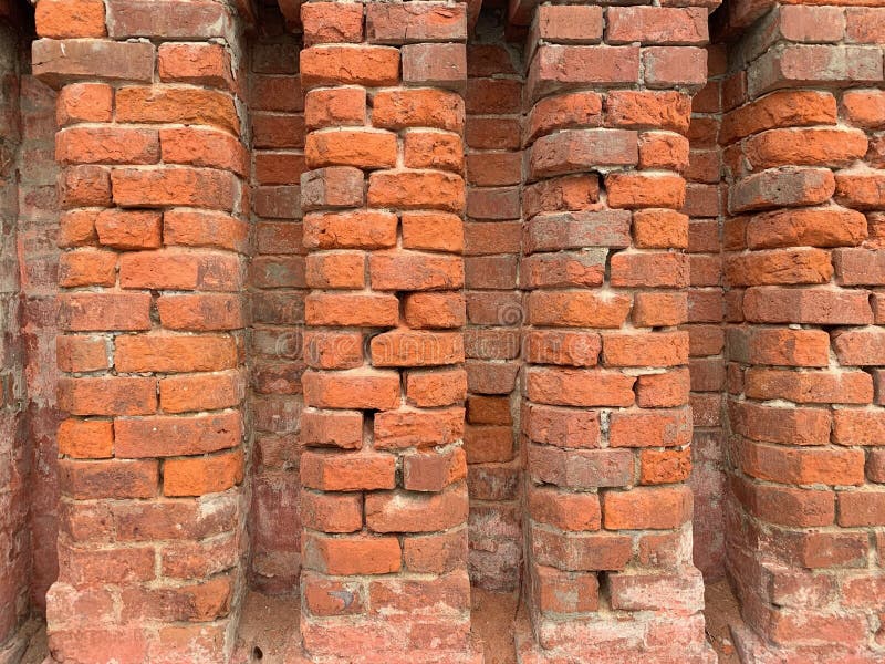 A column of old, red brick stock image. Image of abstract - 141577127