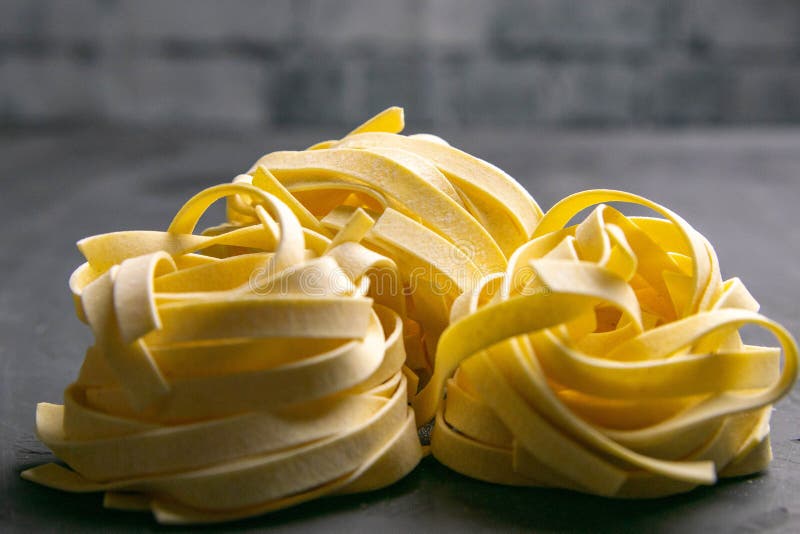 Column Raw Dry Nest Pasta with Reflection Isolated on Black Stock Image ...