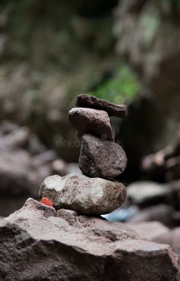 Column of Rocks on the Ground with Blur Background in the Forest Stock ...