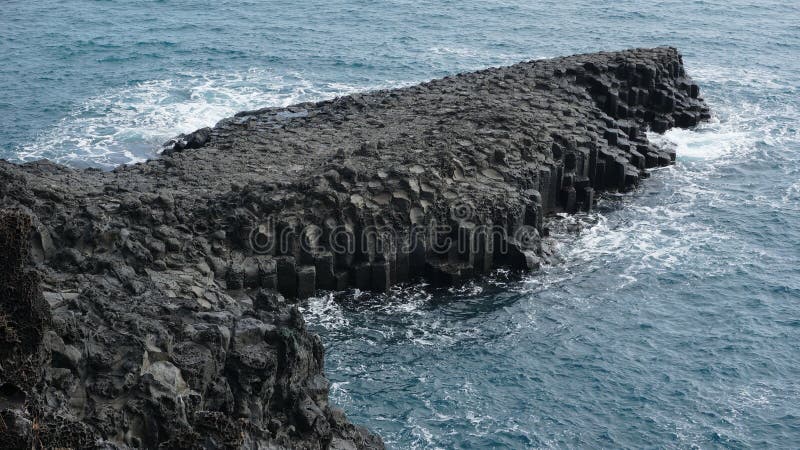 Columnar Joint Formation at the Shore Stock Photo - Image of splashing ...