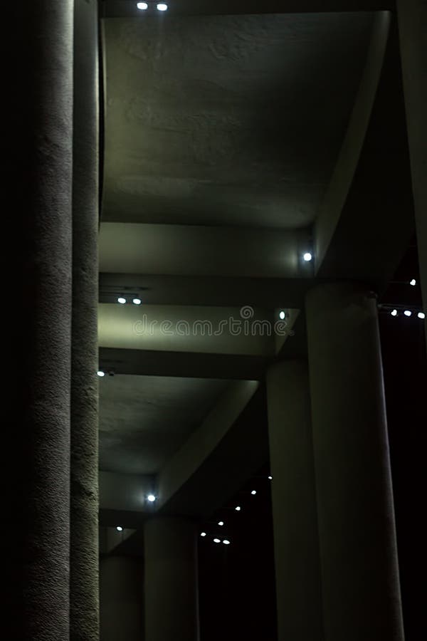 Columns of a Building with a Backlight from Above Stock Image - Image ...