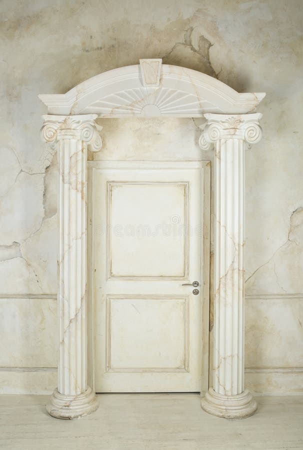 Columns and closed door stock photo. Image of interior - 65479690