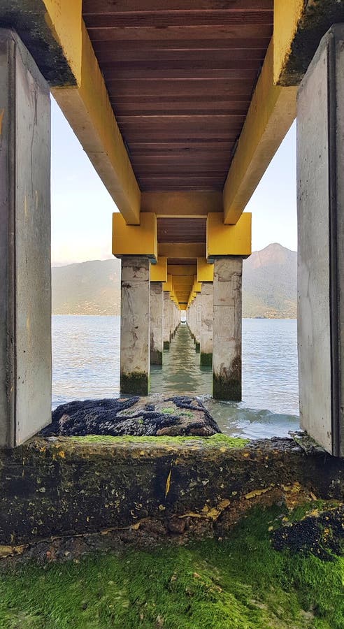 Columns in Perspective Under Pier in Sao Sebastiao - Brazil Stock Image ...