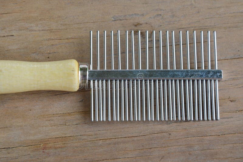 Comb with Teeth Away and Fine Side for Pet on Wooden Board Stock Photo ...