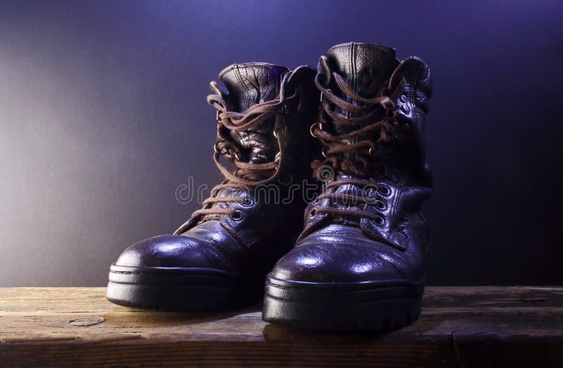 COMBAT BOOTS with a BLUE HUED BACKGROUND Stock Photo - Image of pair ...
