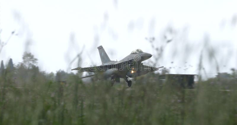 Combat Fighter Jet Rain Landing Amid Tall Grass Stock Video - Video of ... Combat Fighter Jet Rain Landing Amid Tall Grass Stock Video - Video of ...