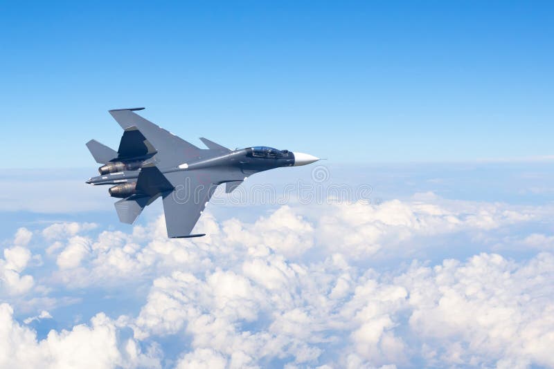 Combat Fighter Jet Flies Turning Maneuver High in the Sky Above the ...