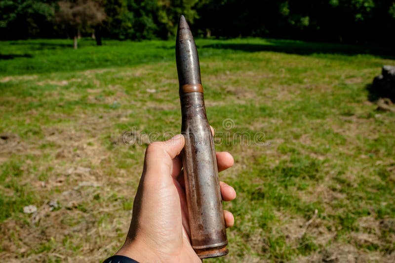 Combat Large-caliber Ammunition with a Bullet in the Hands Stock Photo ...