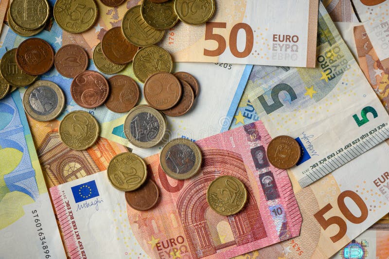 A Combination of Different Euro Banknotes and Euro Coins As a Closeup 2 ...
