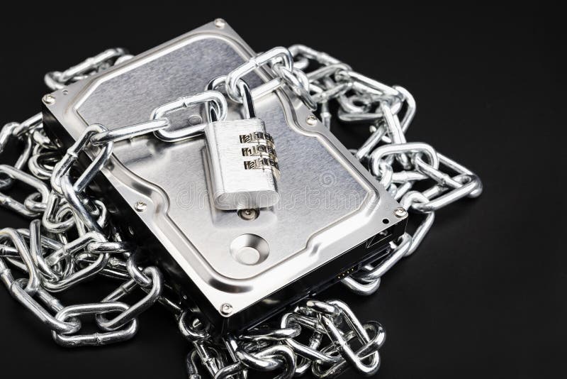 Combination Key Locked with Metal Chain and Hard Disk on a Black ...